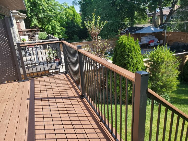 Azek PVC deck with drink railings - Decksforlife