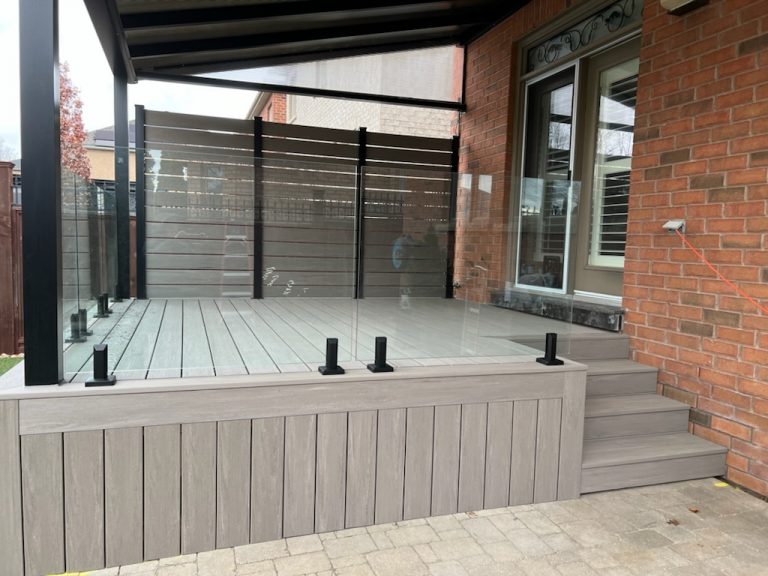 Azek PVC deck with glass railings - Decksforlife